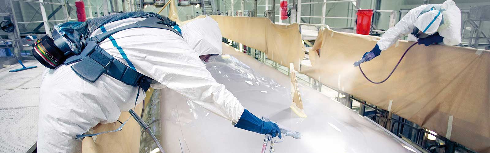 Why are safety coveralls important?
